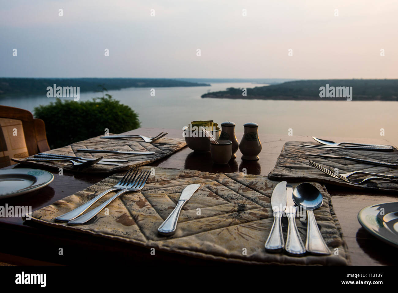 Africa, Uganda, Ready set table in a restaurant, above the Kazinga ...