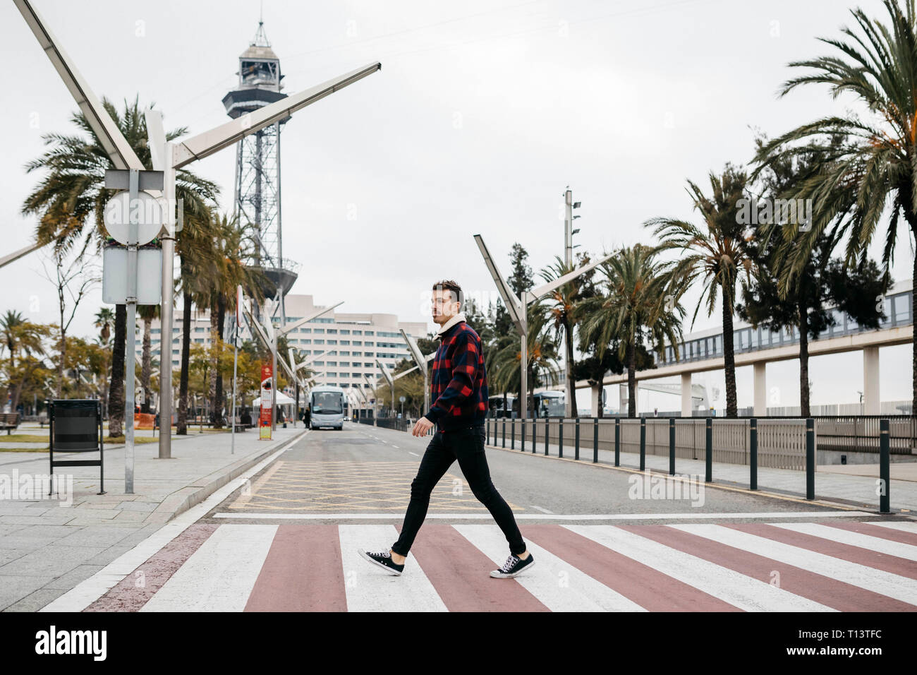Man walking on pedestrian crossing hi-res stock photography and images ...