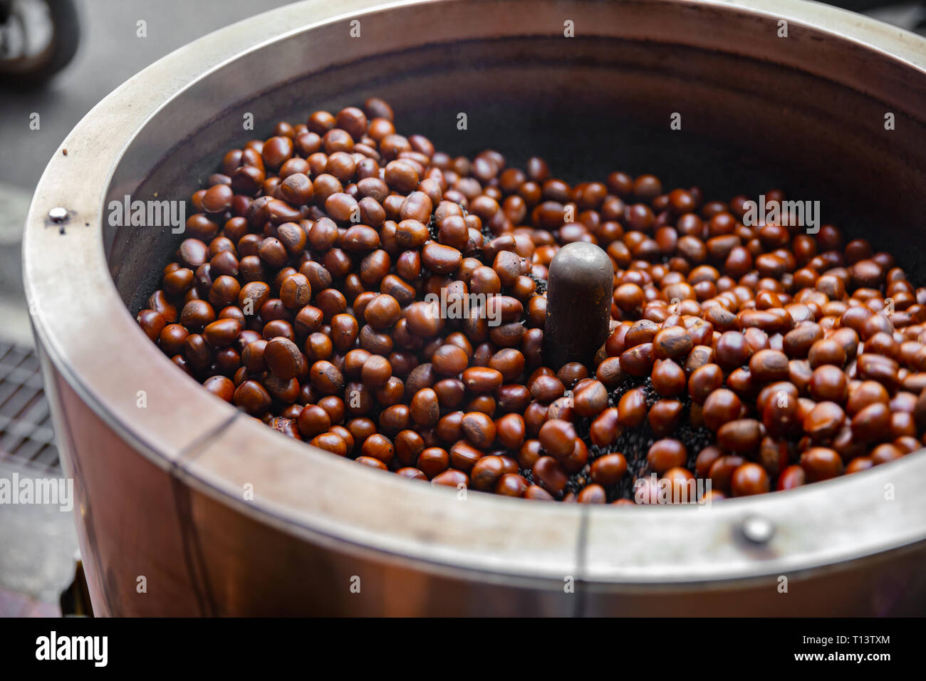 Roasting Brown Chestnuts In Big Pot At Local Street Market Stock Photo ...