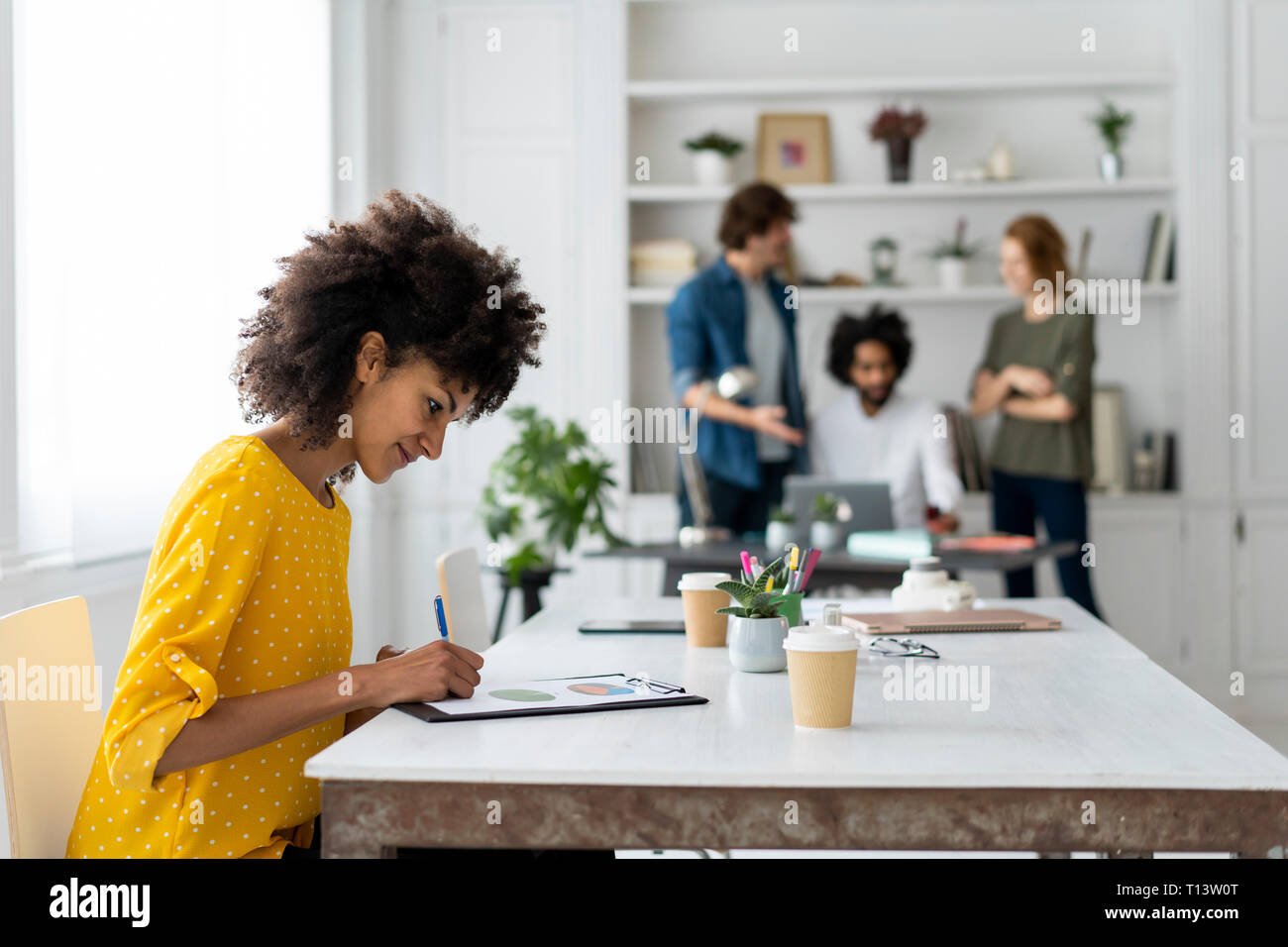 Woman woking cowrking space hi-res stock photography and images - Alamy