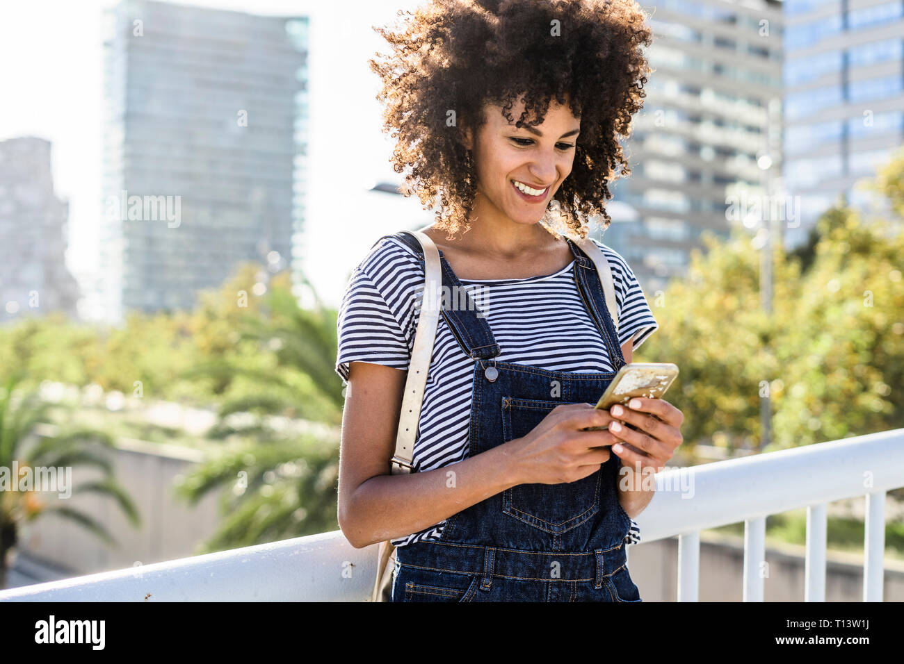 Woman standing bridge hi-res stock photography and images - Alamy