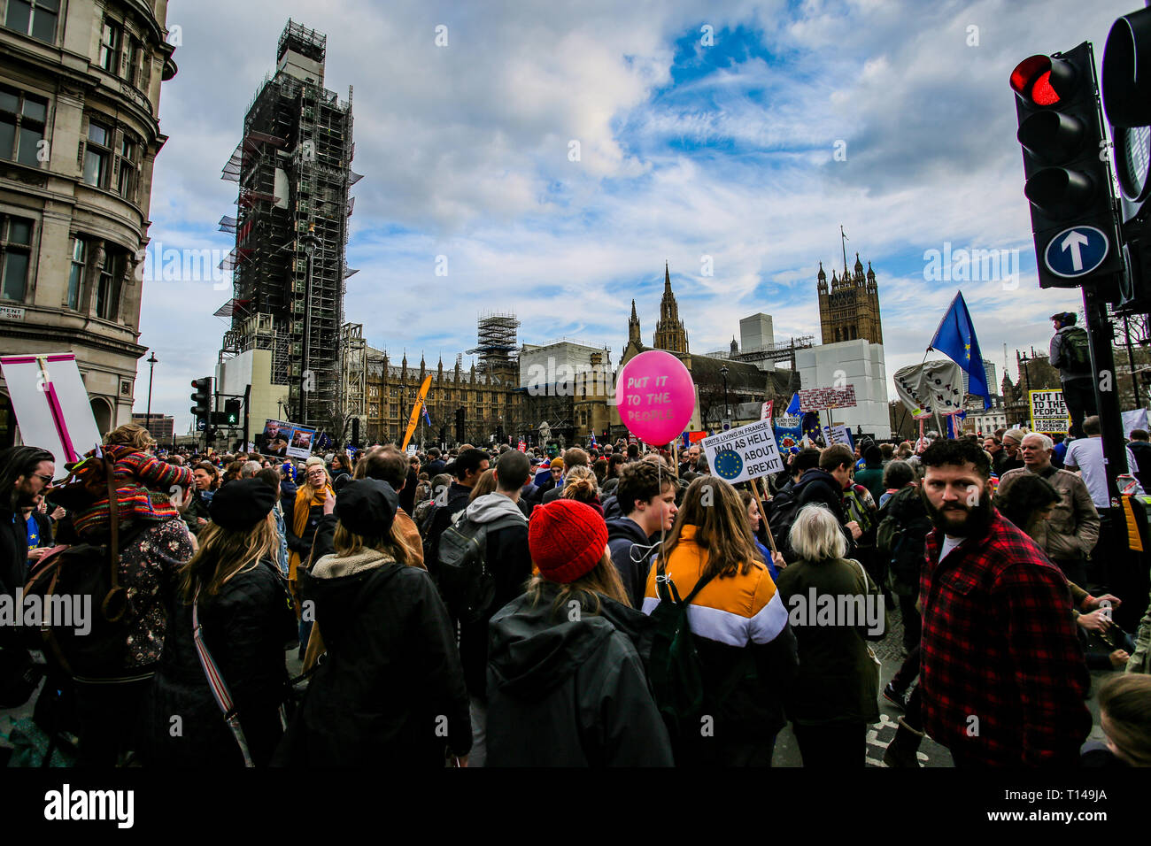 Large crowd on parliament square, with big ben in the background ...
