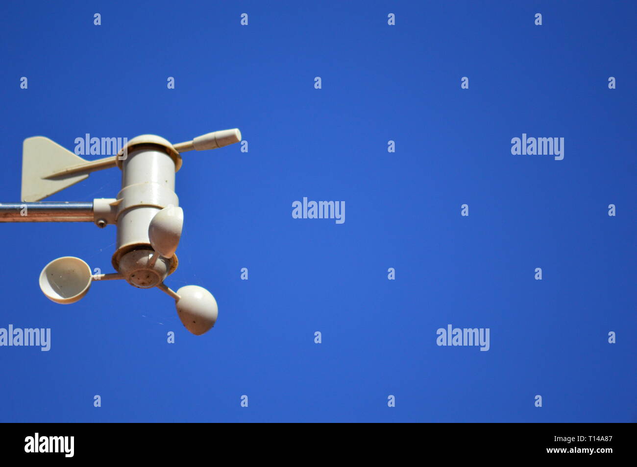 An anemometer with blue sky background Stock Photo - Alamy