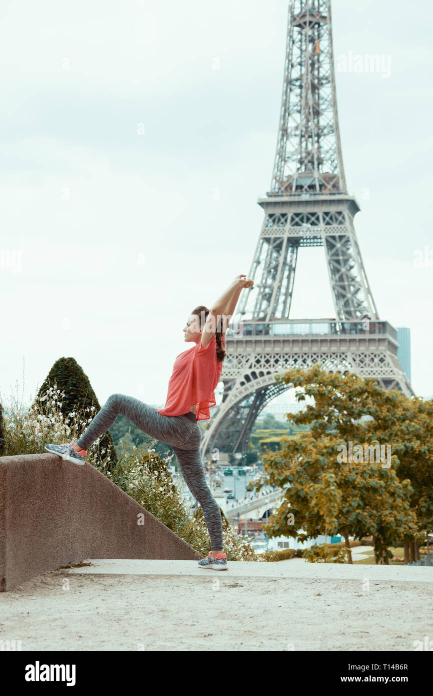 fit sports woman in fitness clothes stretching against clear view of ...