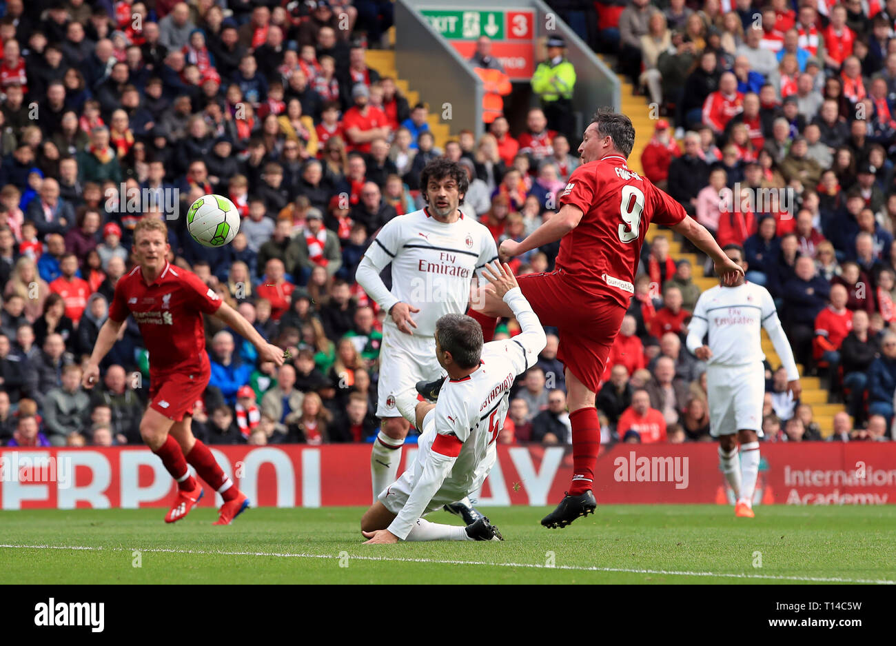 Liverpool's Robbie Fowler scores his side's first goal of the game ...