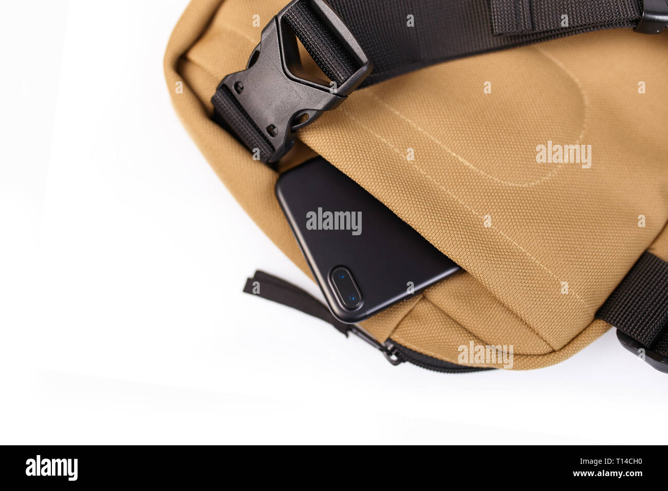 Beige bag on a white isolated background with a hidden pocket for a ...