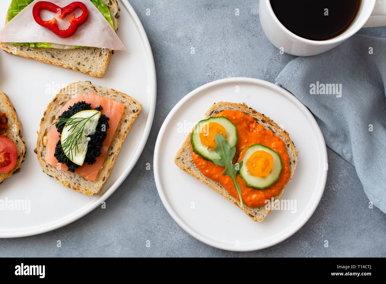 Breakfast toasts with various toppings. Healthy bruschetta. Bread ...
