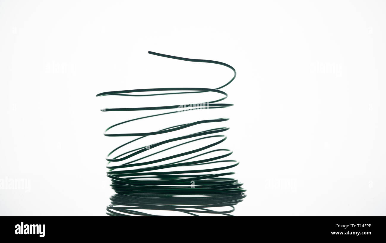 Metal wire on white background Stock Photo - Alamy