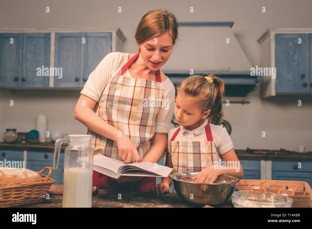 Cooking homemade cakes. Happy loving family are preparing bakery ...