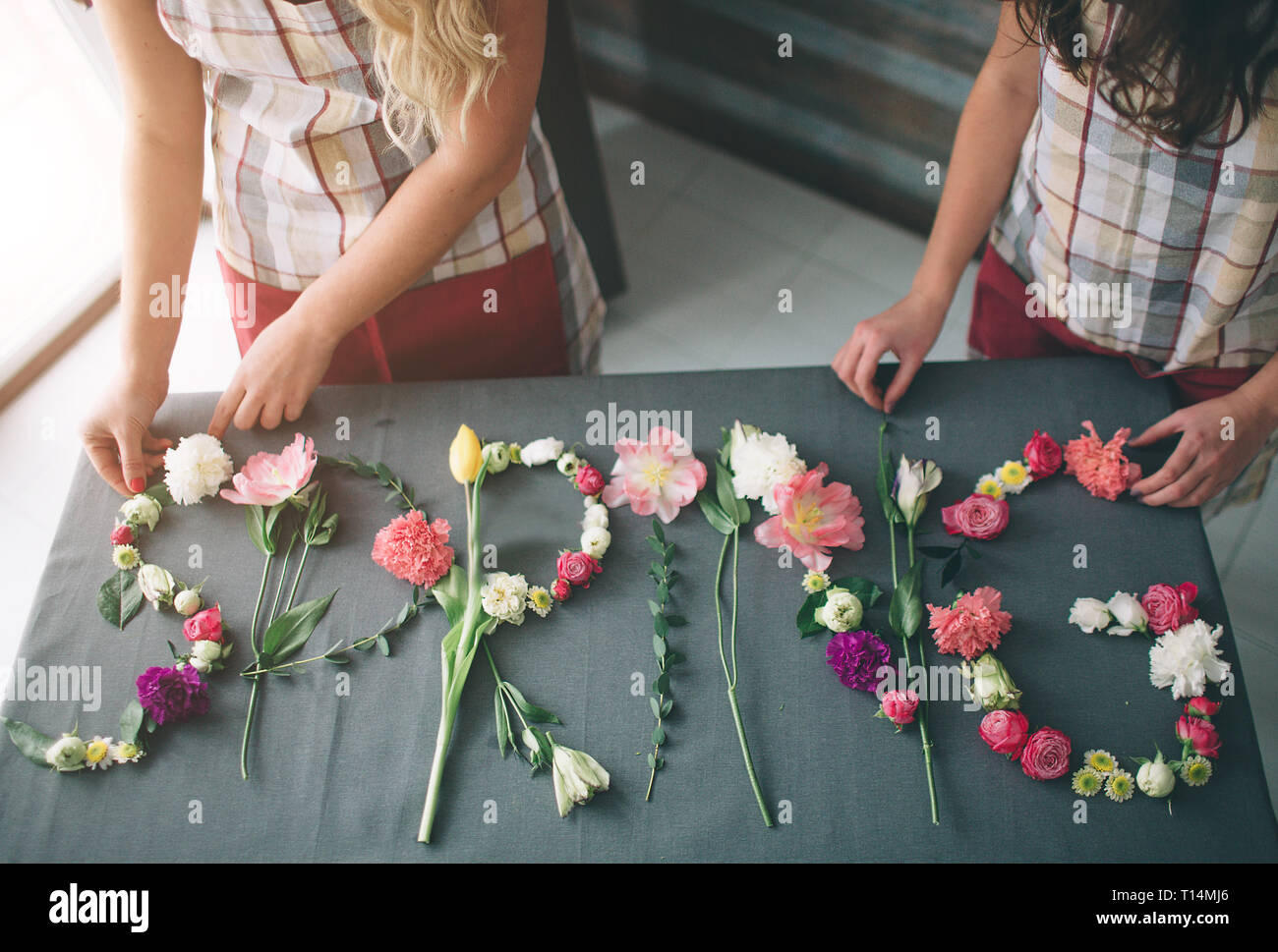 Word spring written flowers hi-res stock photography and images - Alamy