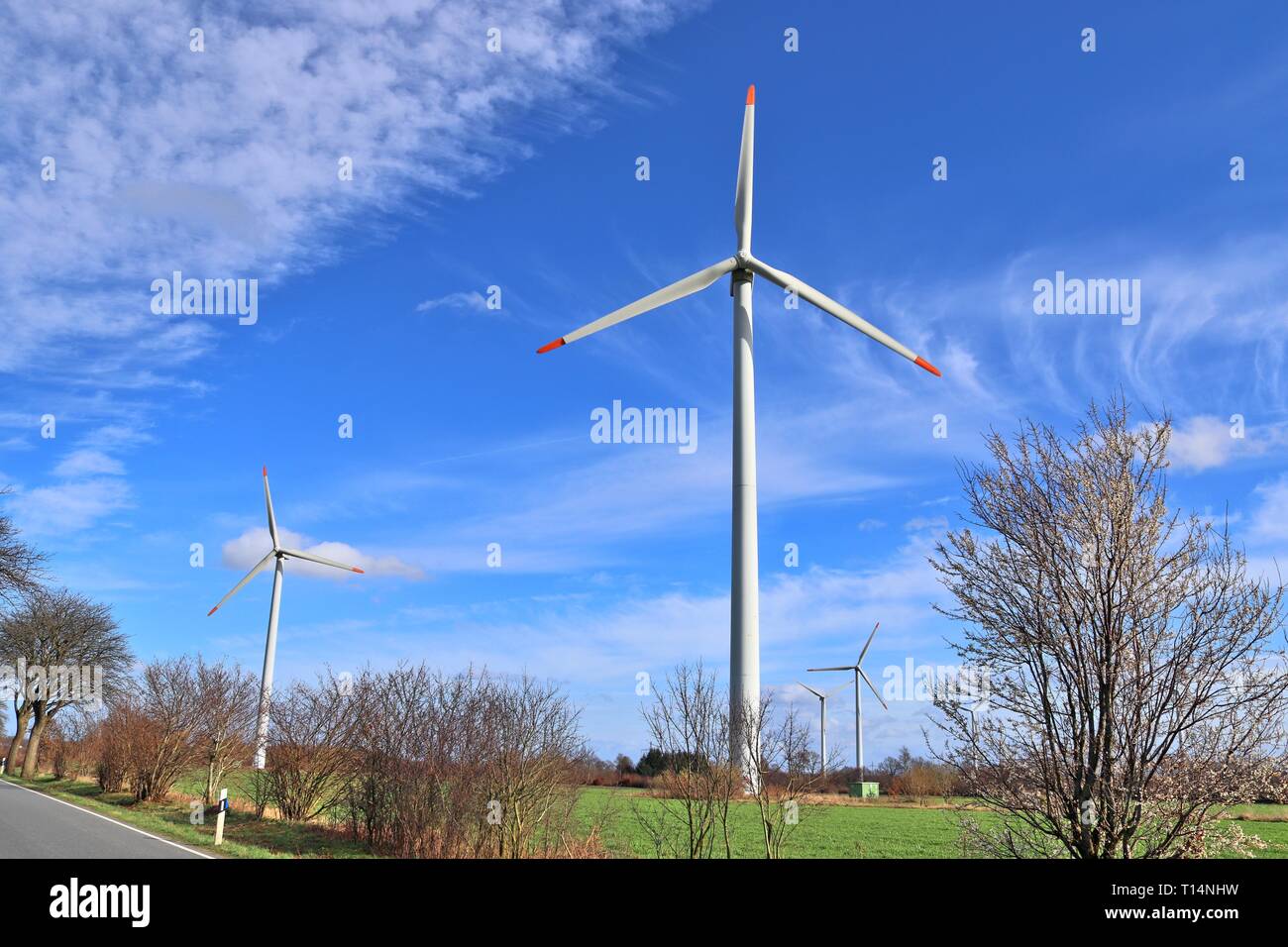 View on alternative energy windmills in a windpark in northern germany ...
