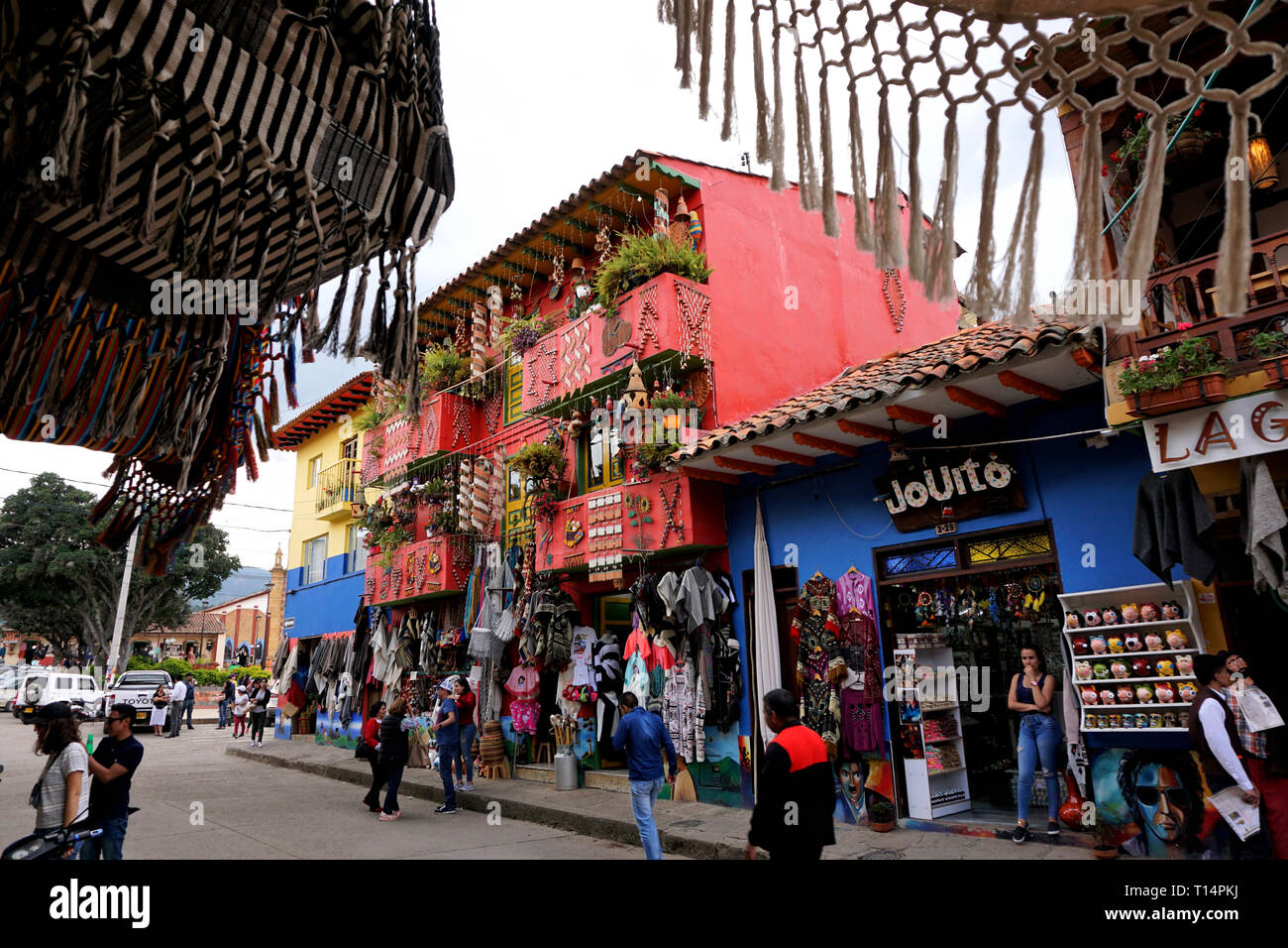 Scenic Street with Shops and Weekend Shoppers in Raquira, Colombia’s ...
