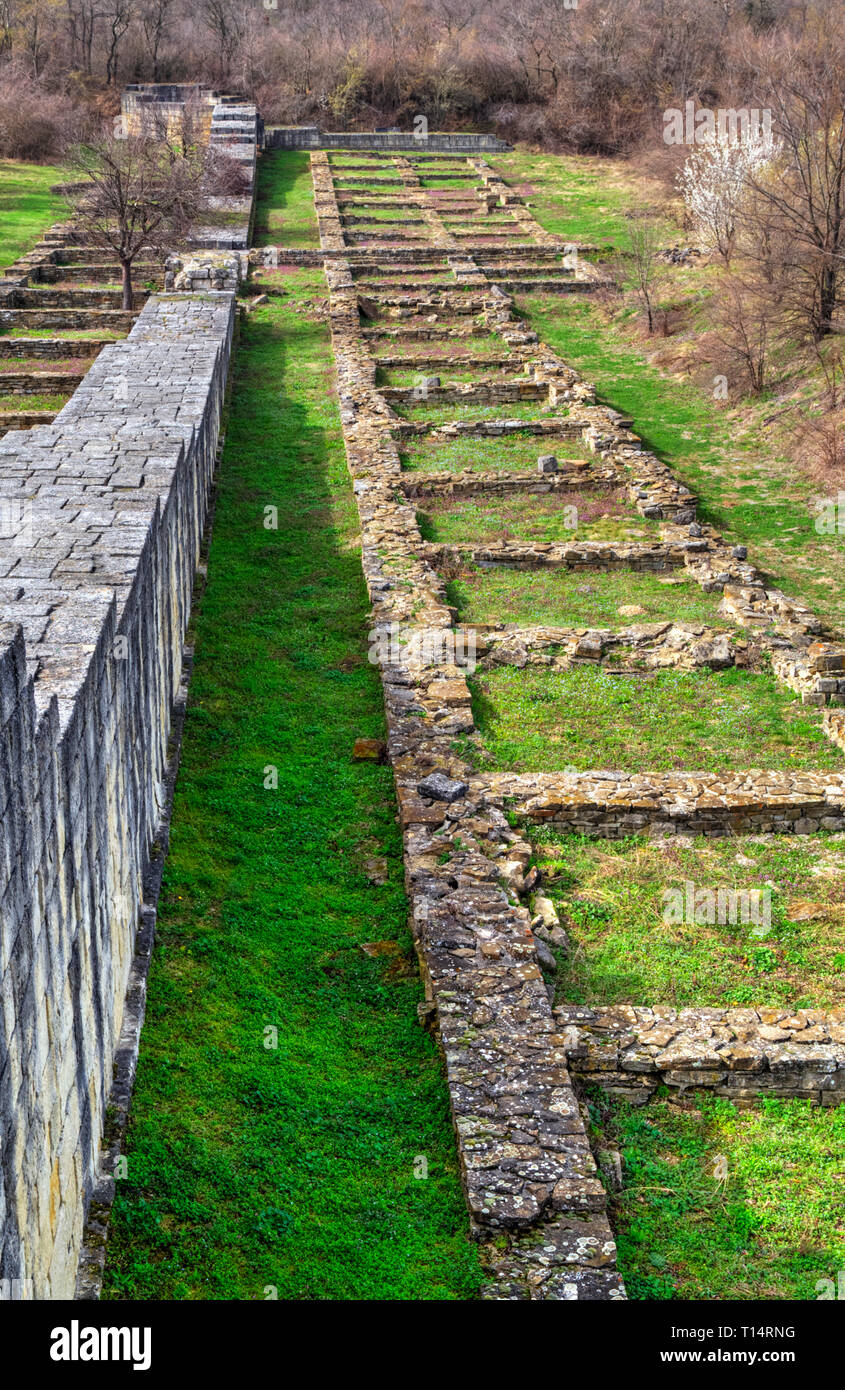 Solid stone wall and ruins of ancient fortress Stock Photo - Alamy