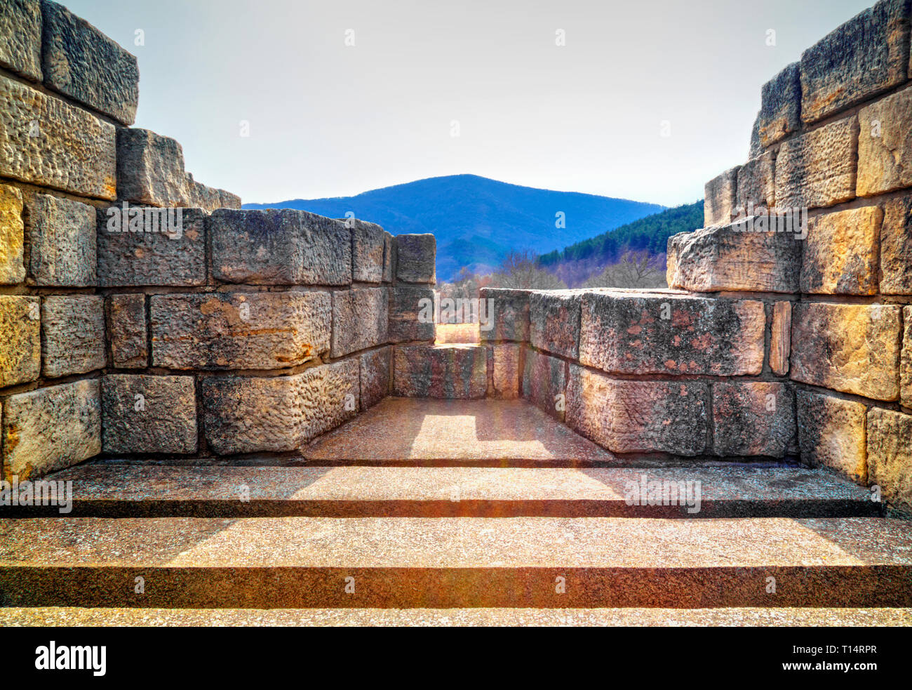 Solid stone wall and ruins of ancient fortress Stock Photo - Alamy