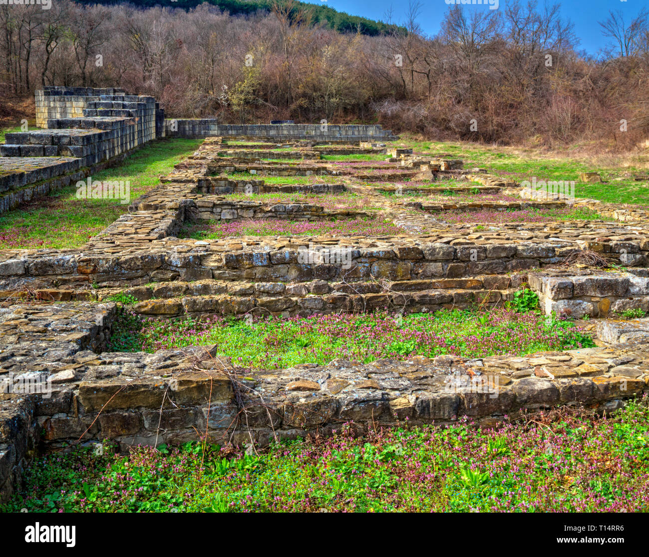 Solid stone wall and ruins of ancient fortress Stock Photo - Alamy