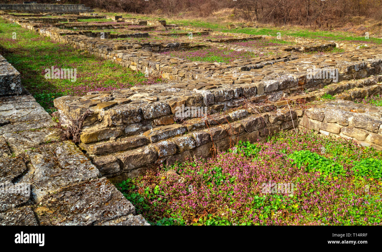 Solid stone wall and ruins of ancient fortress Stock Photo - Alamy