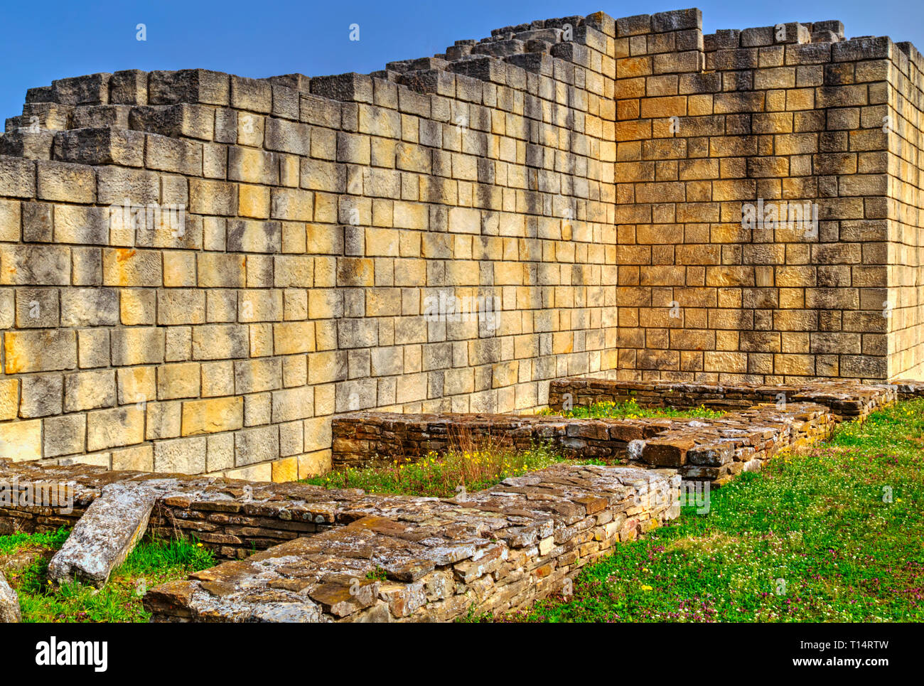 Solid stone wall and ruins of ancient fortress Stock Photo - Alamy