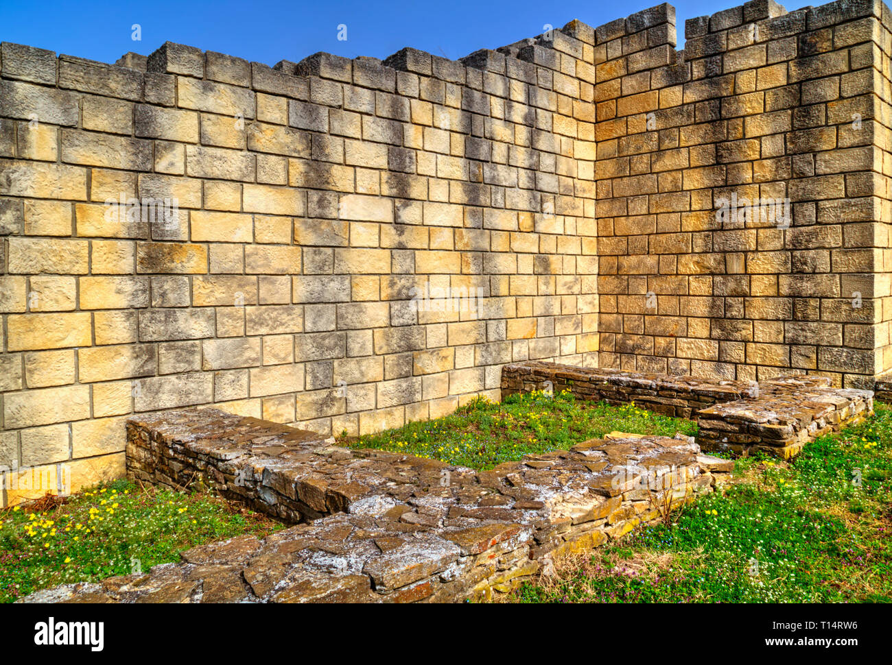 Solid stone wall and ruins of ancient fortress Stock Photo - Alamy