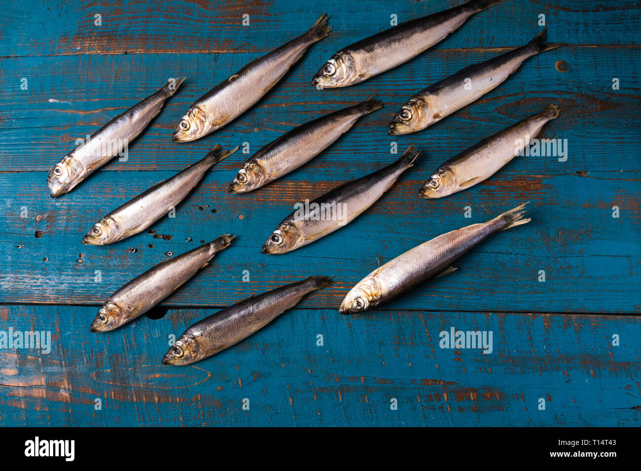 Rustic style. Fish pattern. Herring fish on an old blue wooden ...