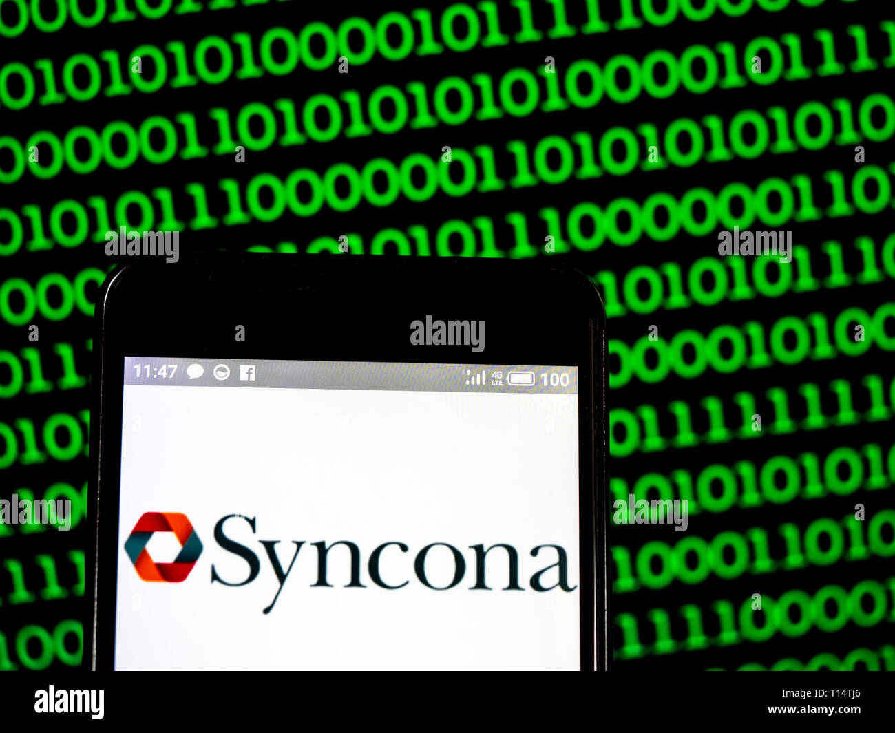 In this photo illustration a Syncona plc logo seen displayed on a smart ...