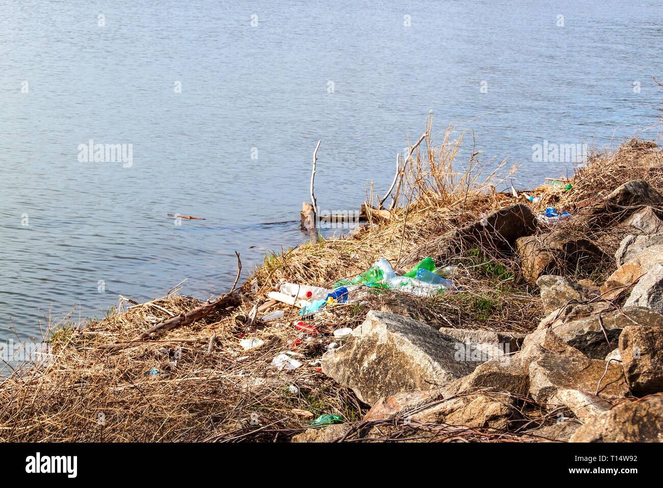 Plastic waste on the lake shore in the Czech Republic. Environmental ...