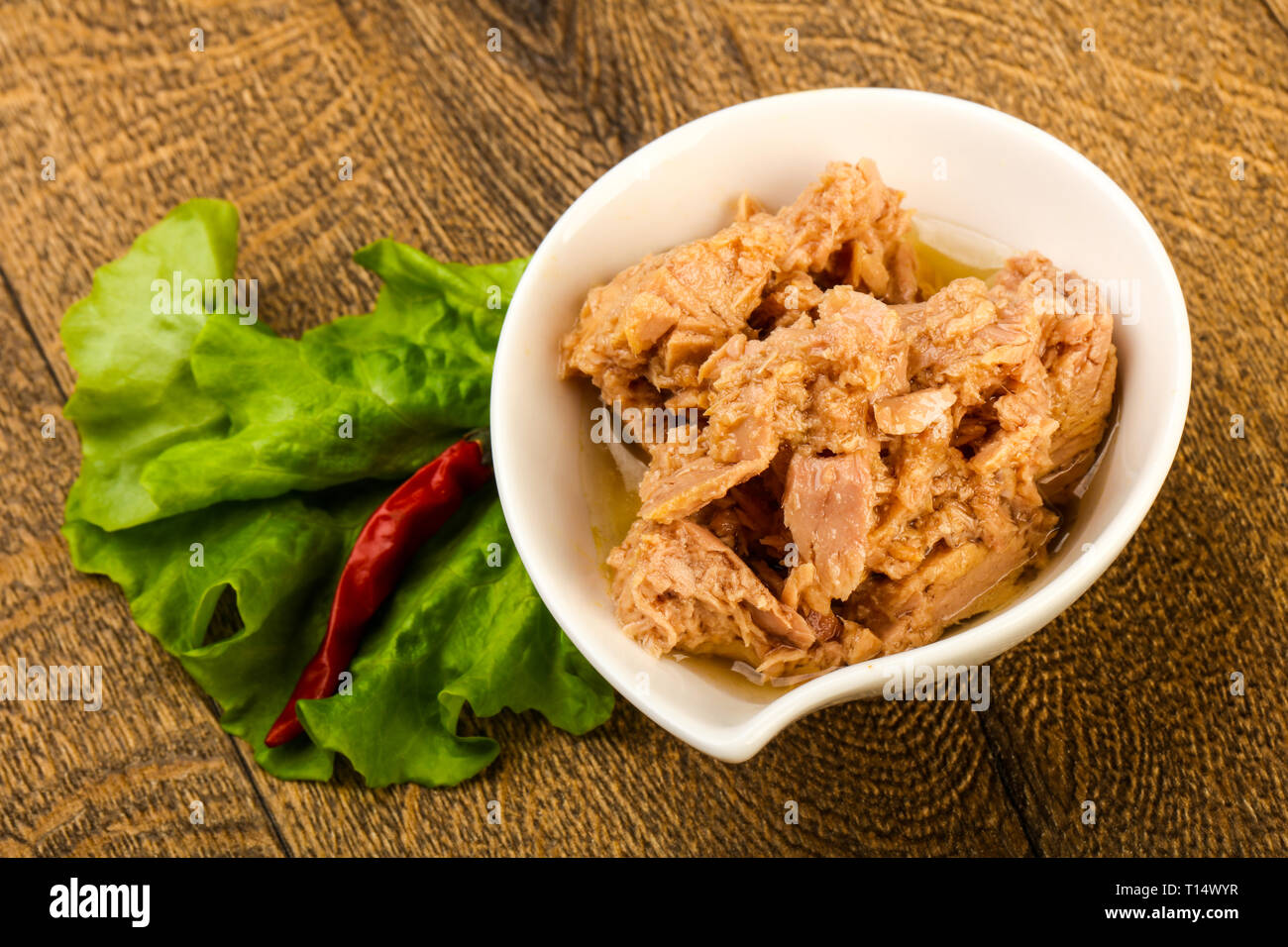 Canned tuna fish in the bowl ready for cooking Stock Photo - Alamy