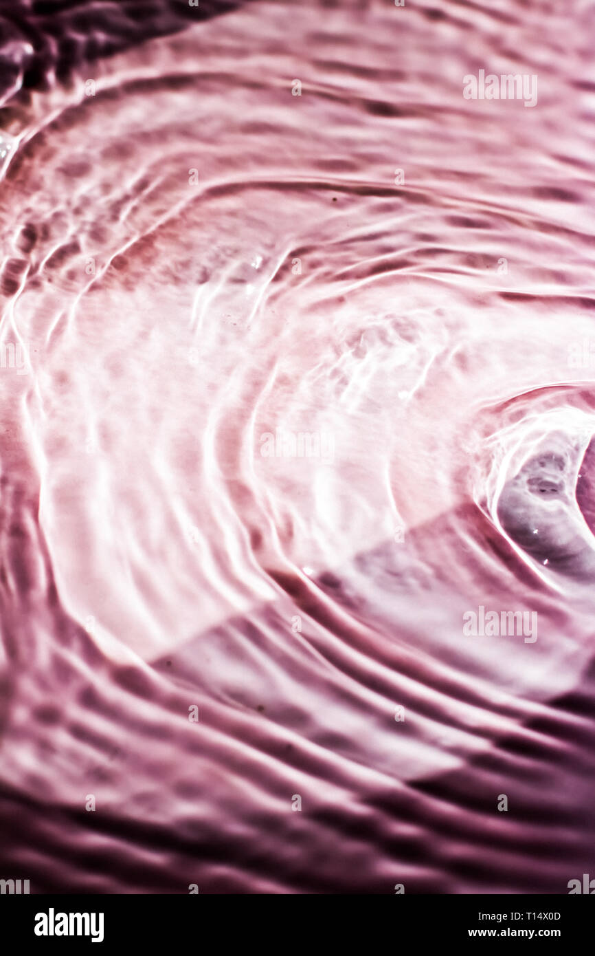 Pink flowing water texture as an abstract background - colourful ...