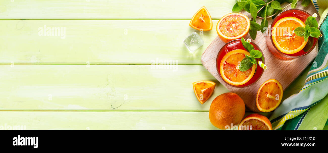 Bloody orange drink and ingredients Stock Photo - Alamy