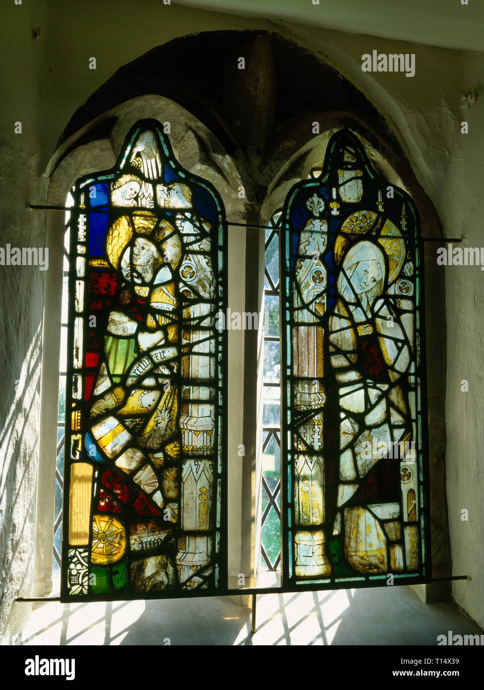 Panels of late Medieval (C15th) stained glass fragments removed from E ...