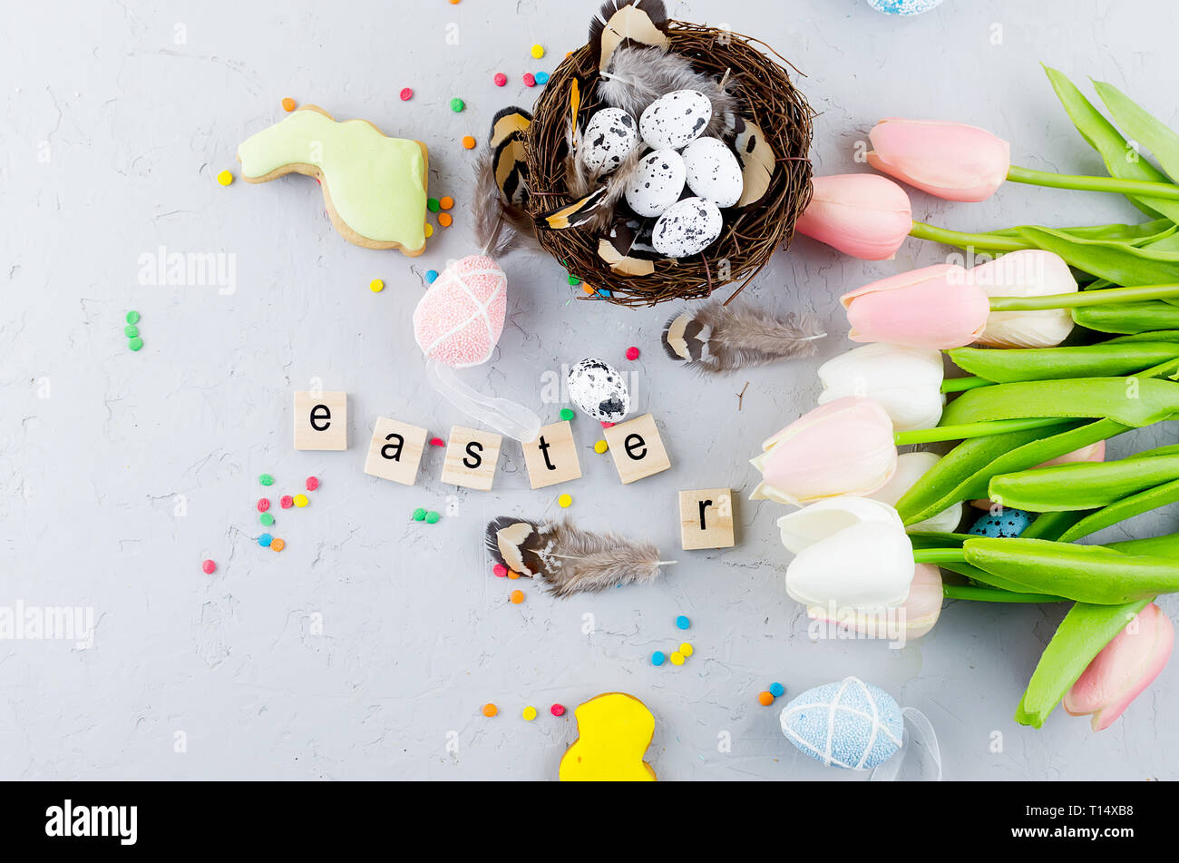Easter colorful gingerbread cookies, small decorative eggs in the nest ...