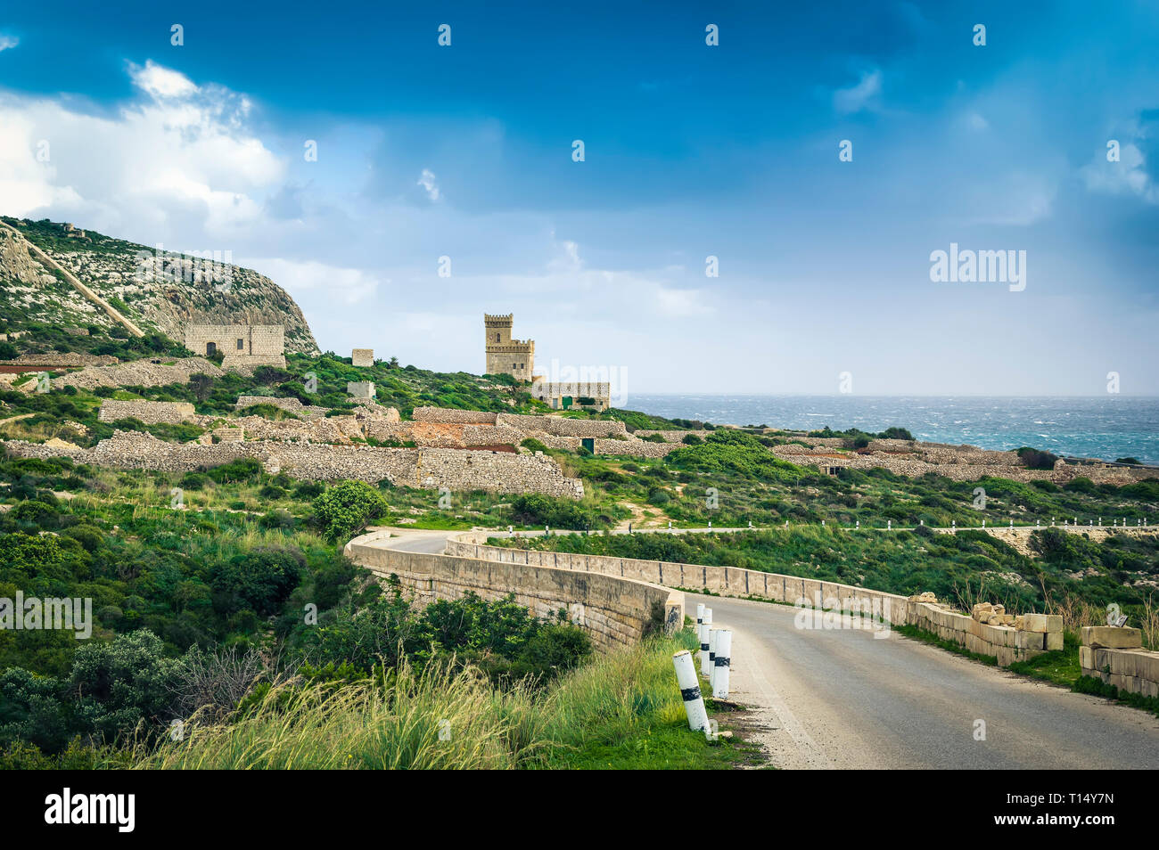 Malta: Scenic road to Ghar Lapsi tower with hilly landscape and sea ...