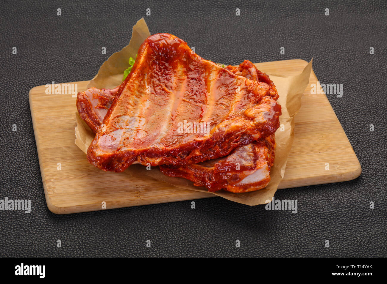 Raw marinated pork ribs ready for cooking Stock Photo - Alamy