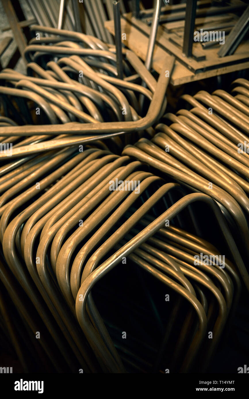 metal pipes stored for work in work shop Stock Photo - Alamy