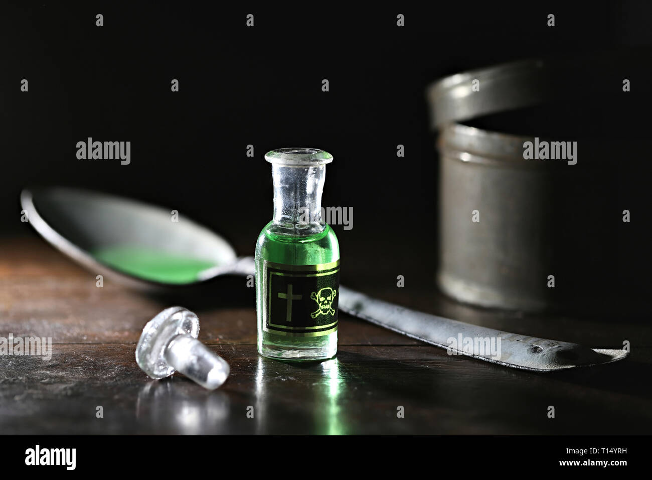 vintage glass bottle of poison Stock Photo - Alamy