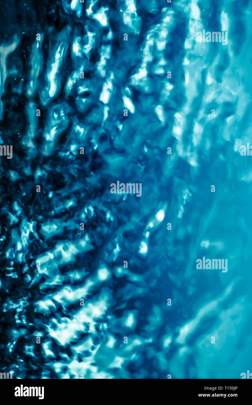 Abstract blue liquid surface as background - futuristic design and ...