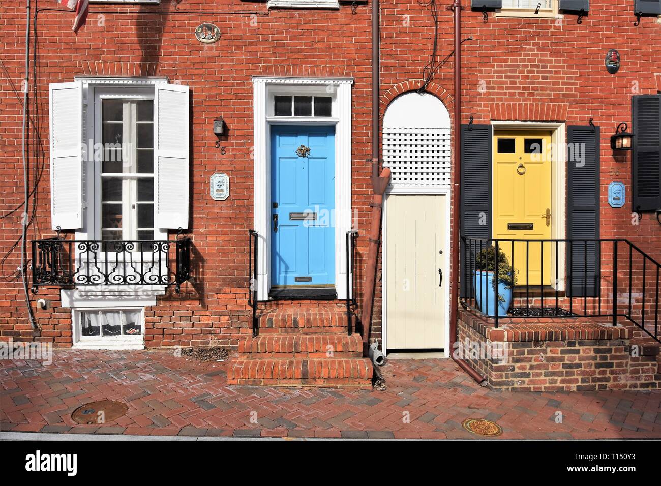 colorful new Blue door on a brick updated and renovated row house in ...