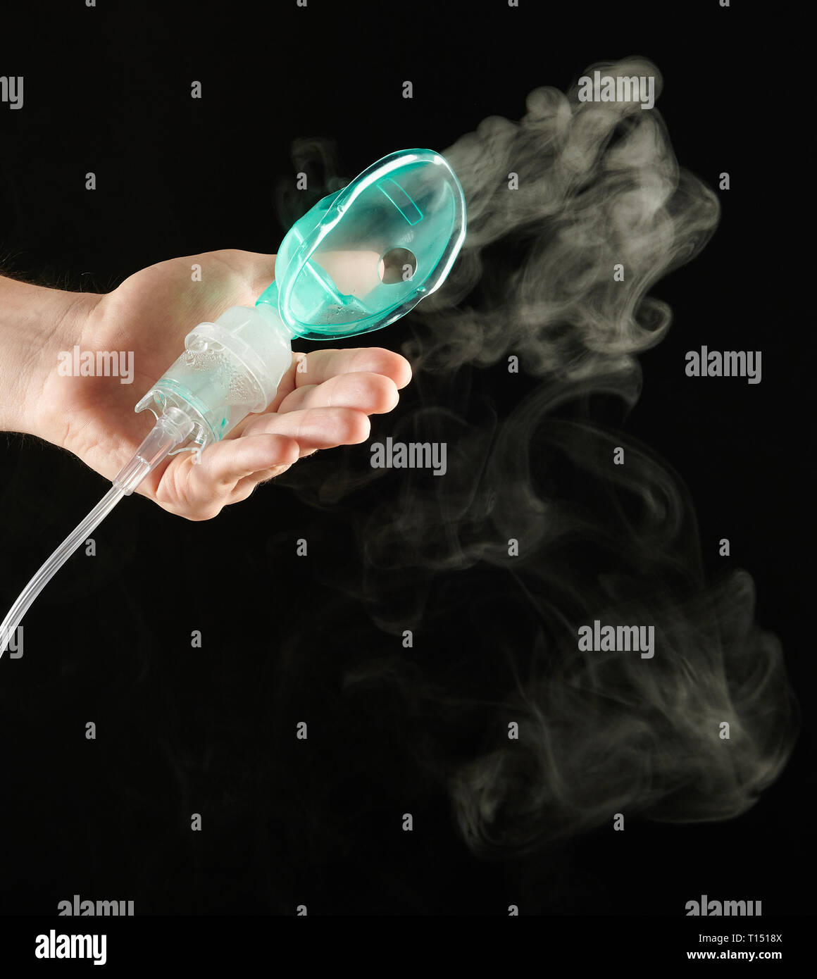 Medical breathing mask lay on hand palm close up with smoke Stock Photo ...