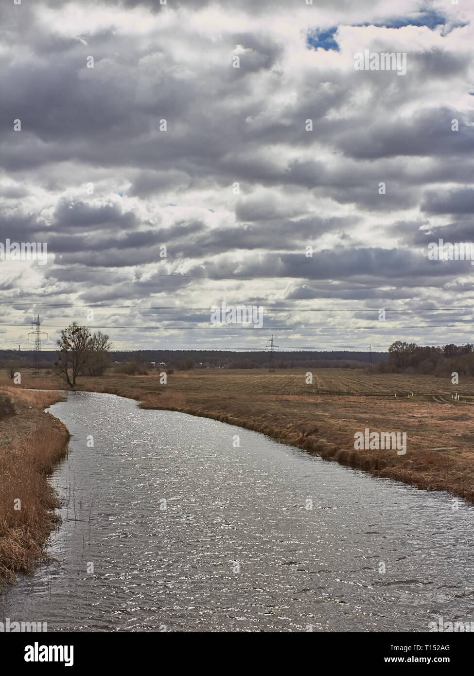Irpen River in the Kiev region of Ukraine on a spring day with a cloudy ...