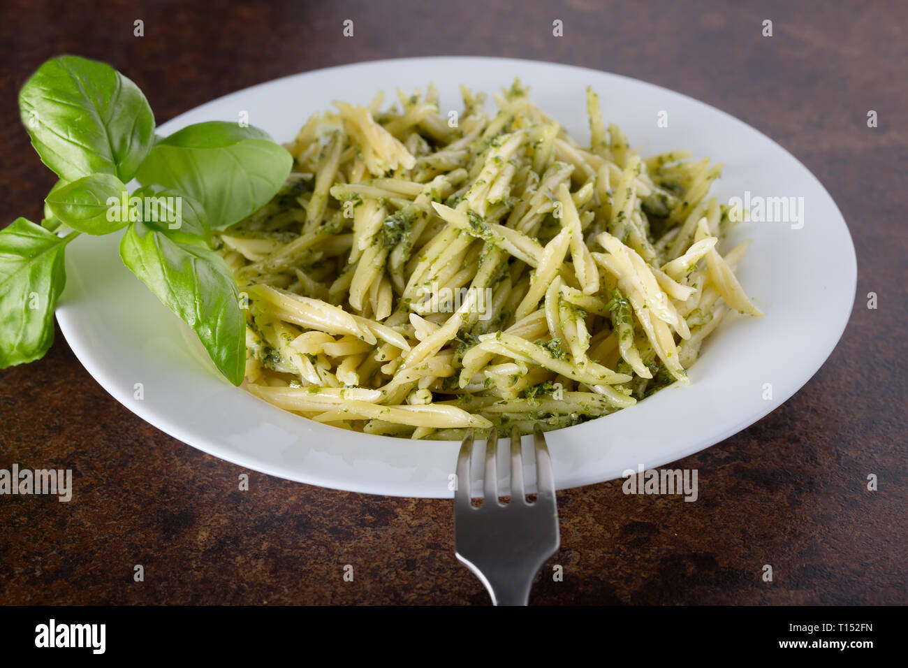 Trofie with genoese pesto sauce, a classic of Ligurian cuisine, Italy ...
