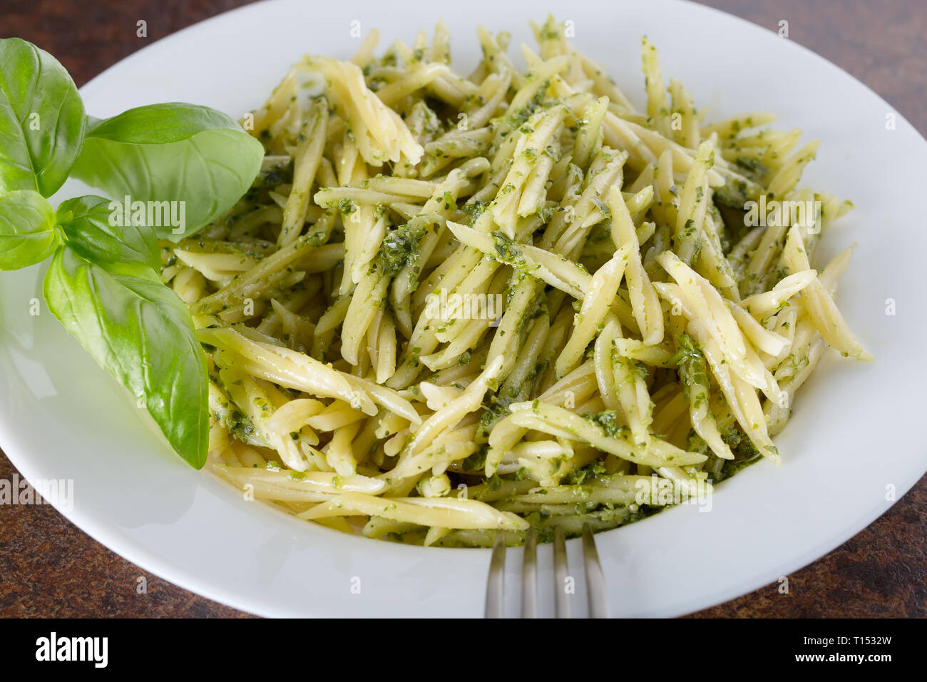 Trofie with genoese pesto sauce, a classic of Ligurian cuisine, Italy ...