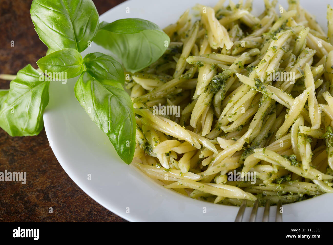 Trofie with genoese pesto sauce, a classic of Ligurian cuisine, Italy ...