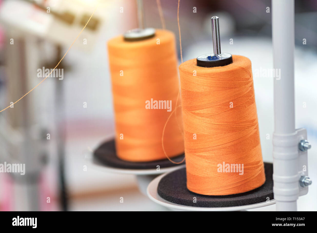 Colorful reels of threads. Background Stock Photo - Alamy