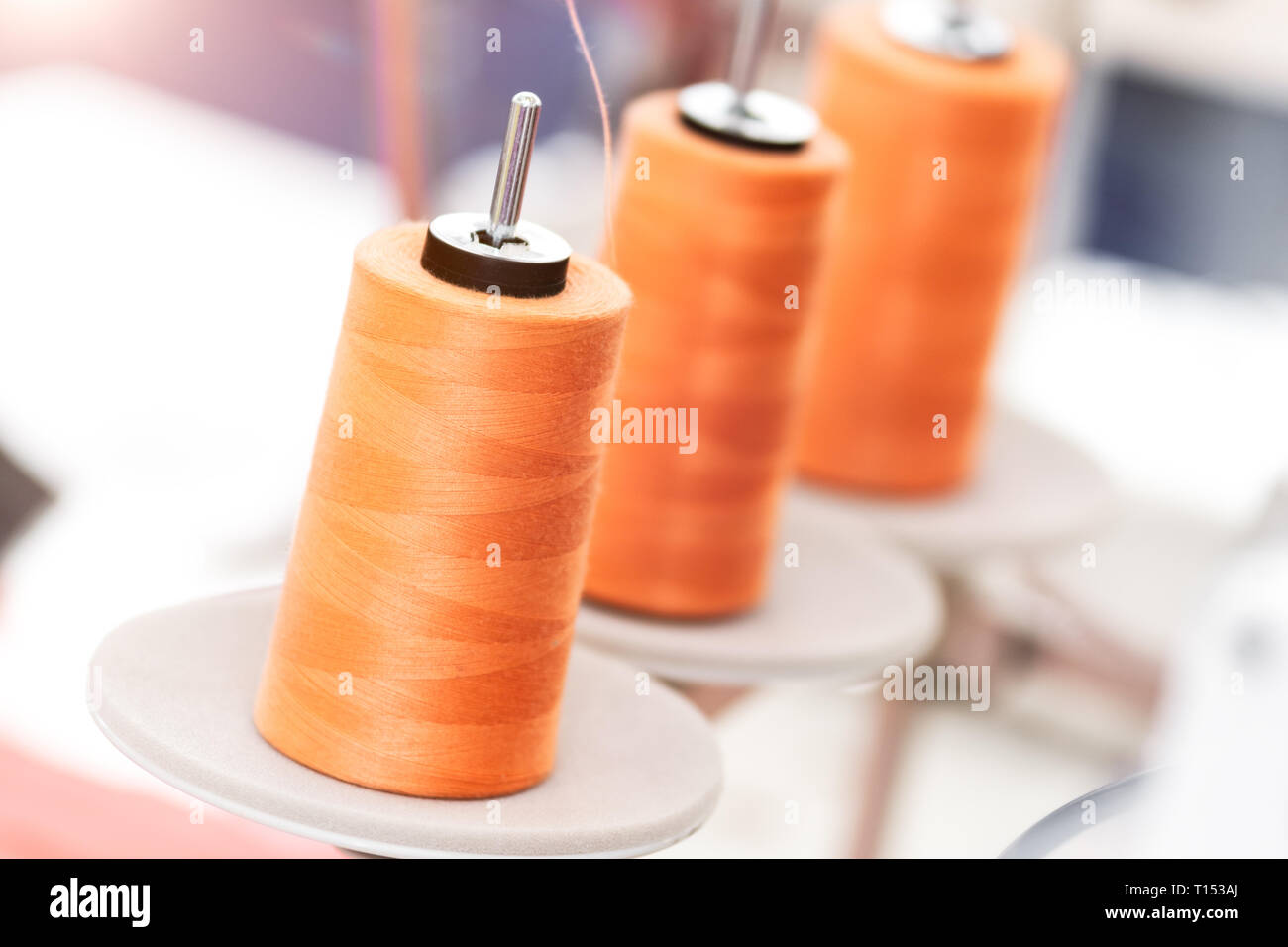 Colorful reels of threads. Background Stock Photo - Alamy