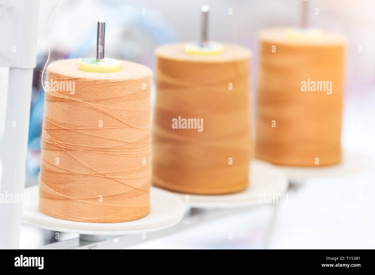 Colorful reels of threads. Background Stock Photo - Alamy