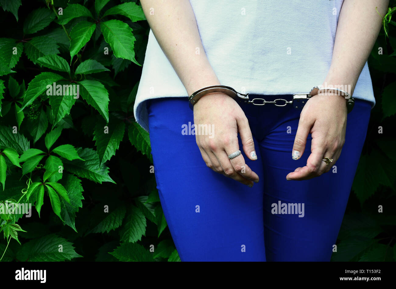 Handcuffed girls hi-res stock photography and images - Alamy