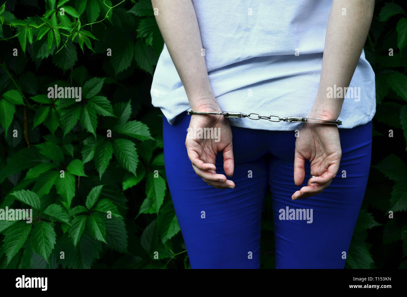 Handcuffed girls hi-res stock photography and images - Alamy