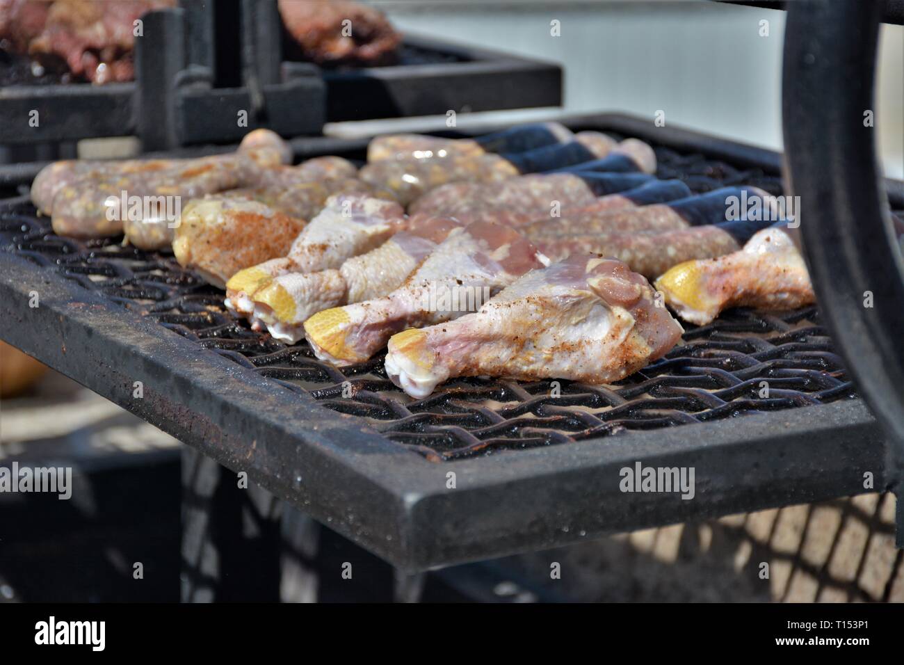 BBQ Bar-B-Que of all cooked meat and chicken Stock Photo - Alamy