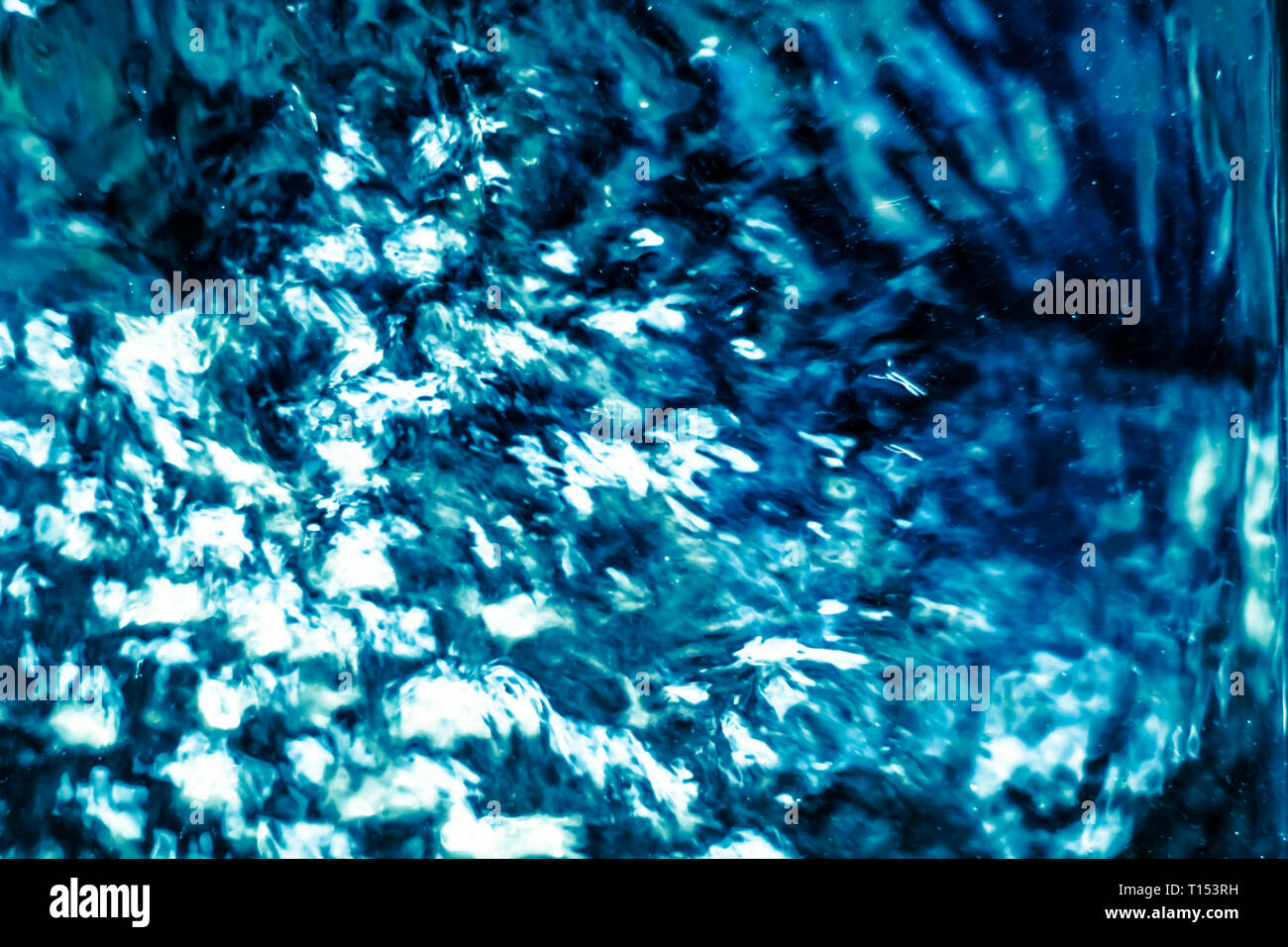 Abstract blue liquid surface as background - futuristic design and ...