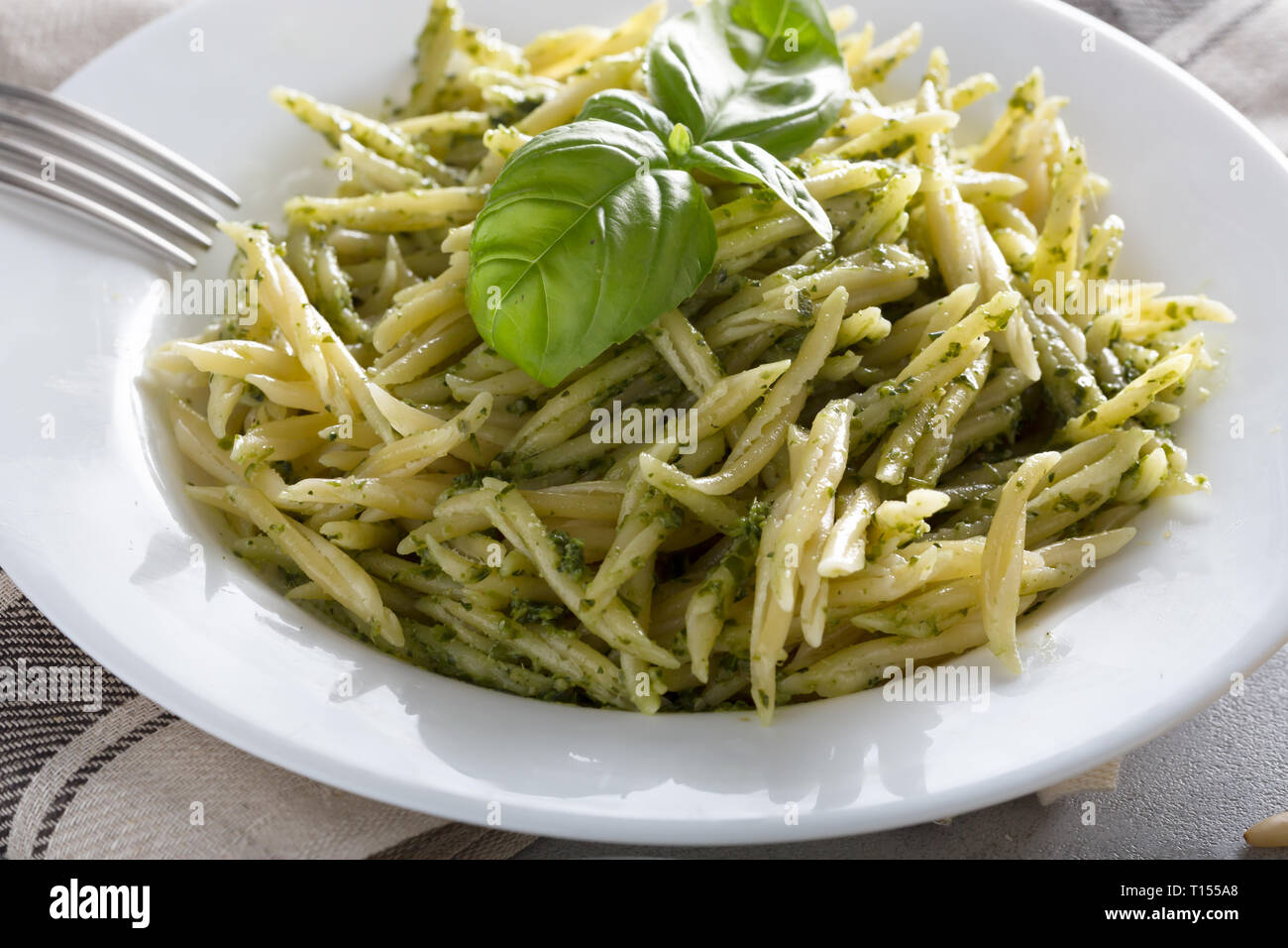 Trofie with genoese pesto sauce, a classic of Ligurian cuisine, Italy ...