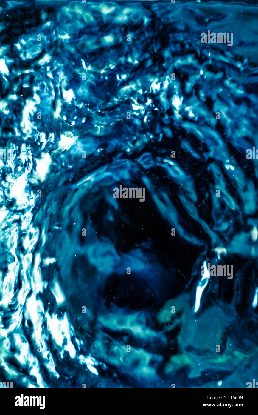 Abstract blue liquid surface as background - futuristic design and ...